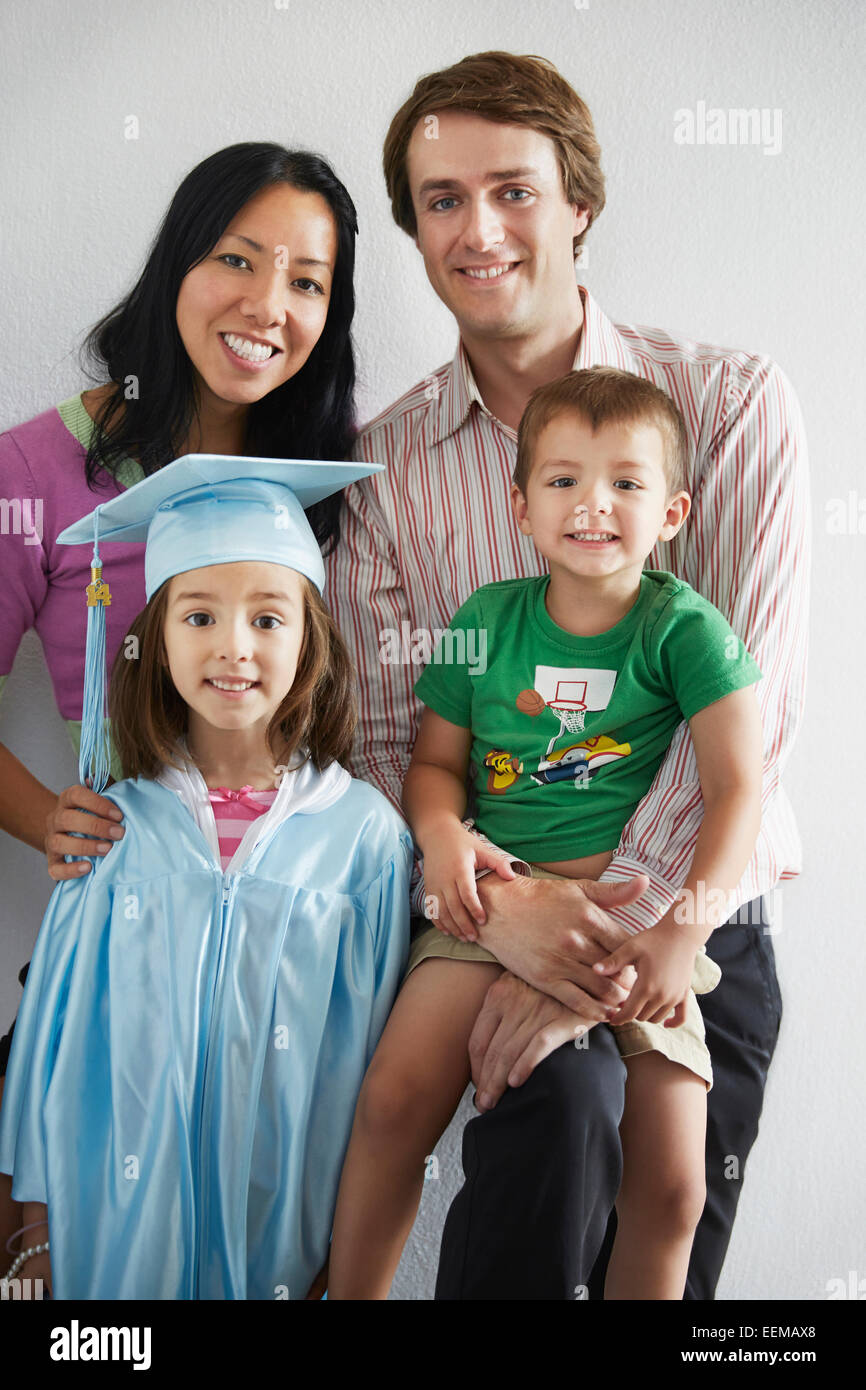 Family with graduating daughter smiling together Stock Photo - Alamy