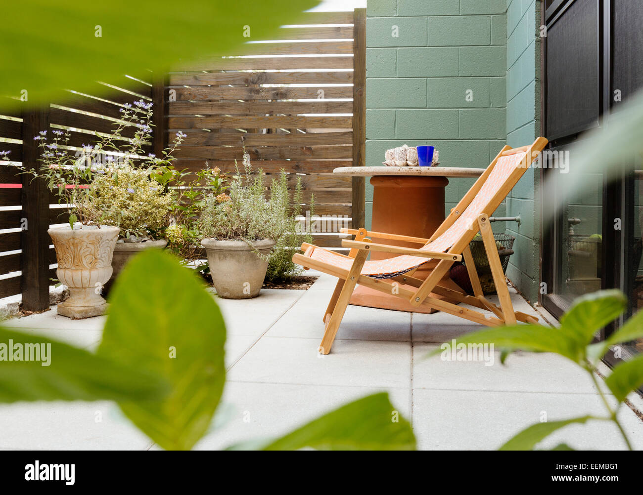 Landscaping and patio of modern condo building Stock Photo - Alamy