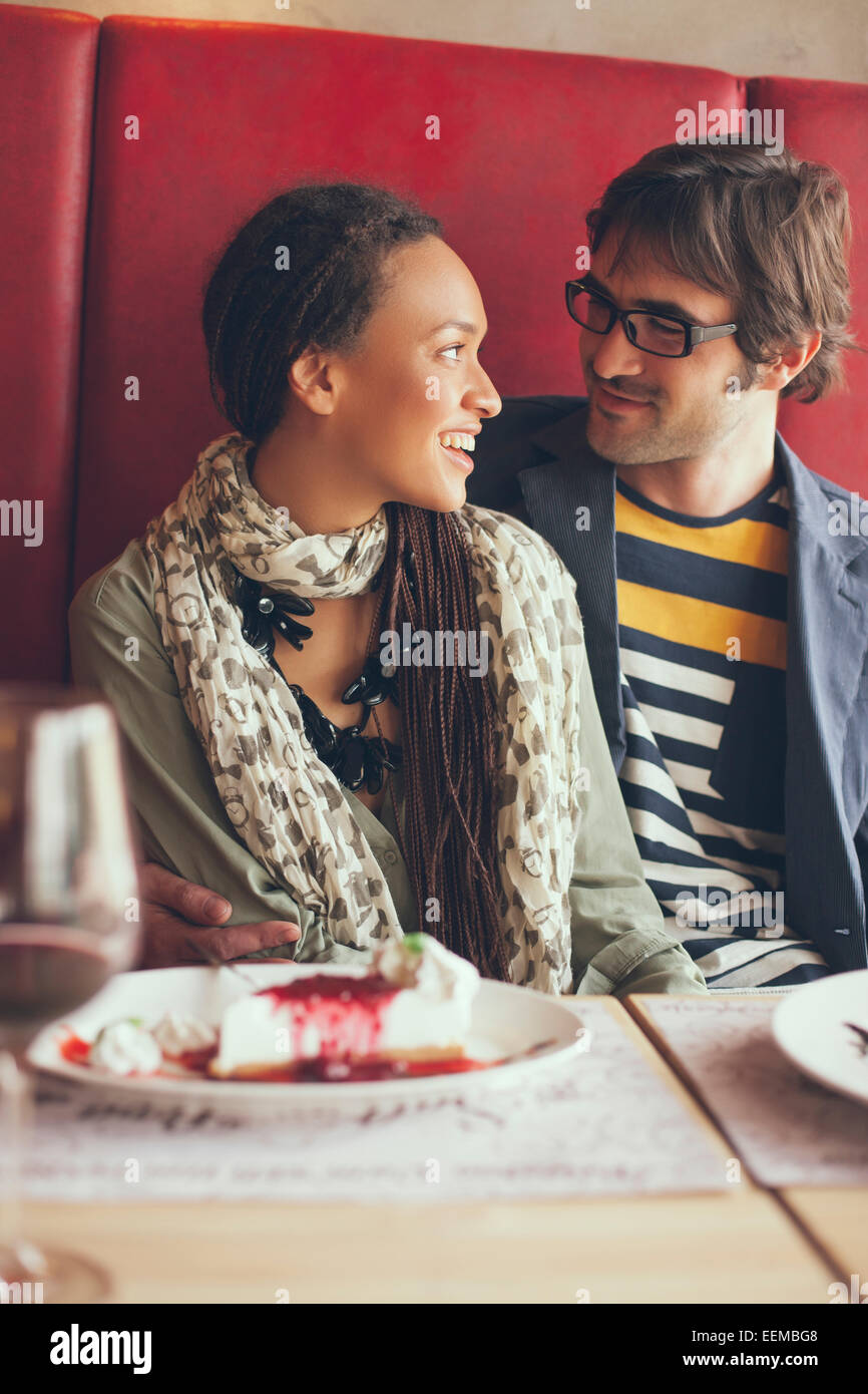 Couple eating dessert in cafe Stock Photo - Alamy