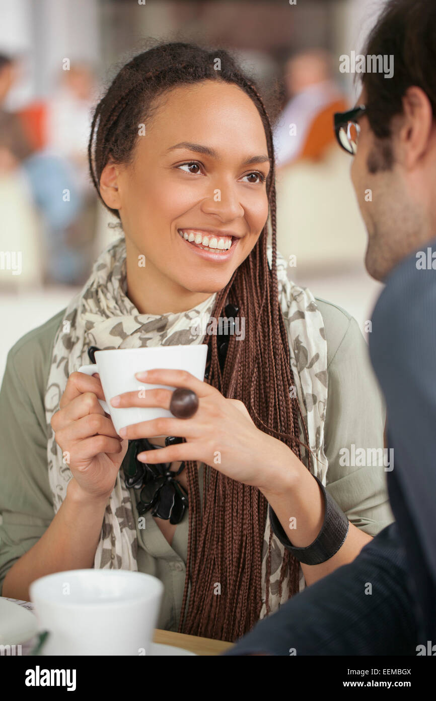 Couple drinking coffee in cafe Stock Photo - Alamy