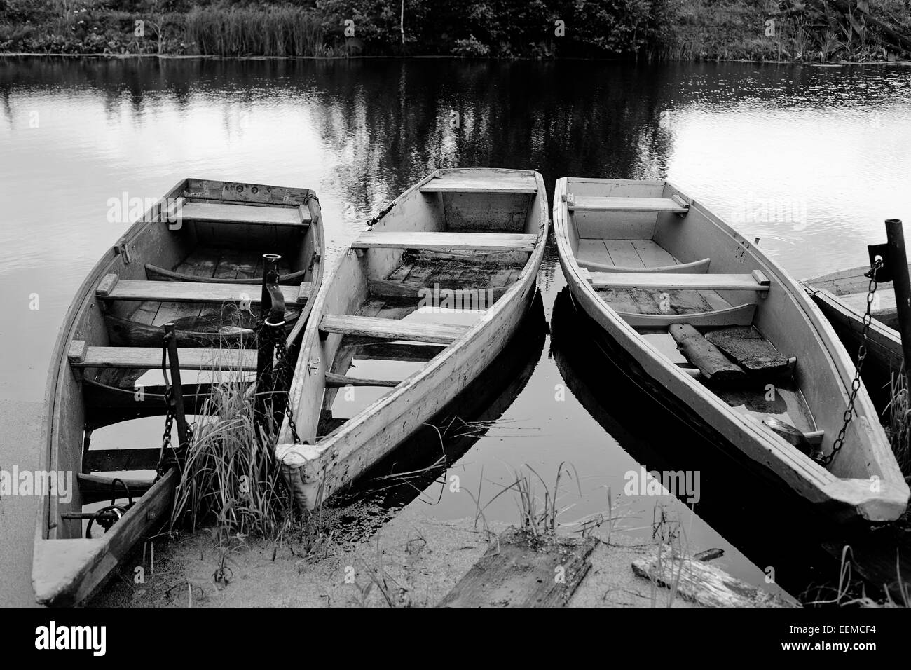 Canoes on river in Black and White Stock Photos & Images - Alamy