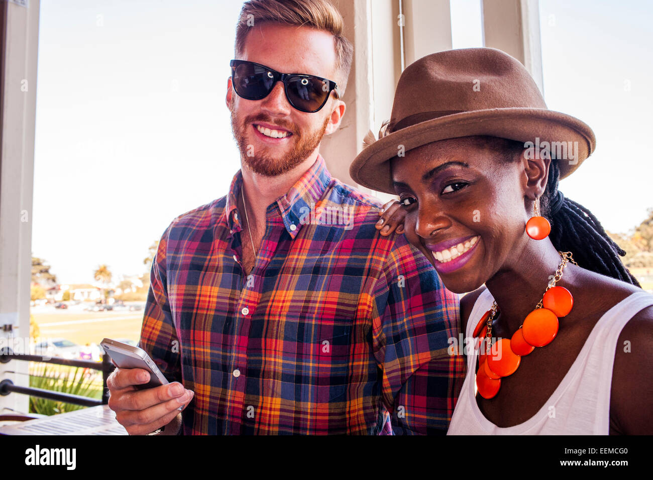 Portrait couple using mobile hi-res stock photography and images - Alamy