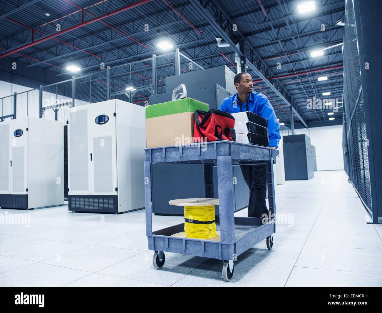 Black technician server room hi-res stock photography and images - Alamy