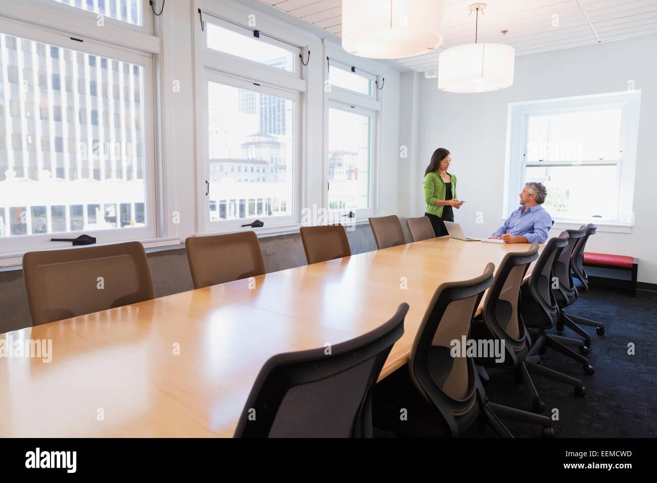 Business people talking in conference room Stock Photo - Alamy