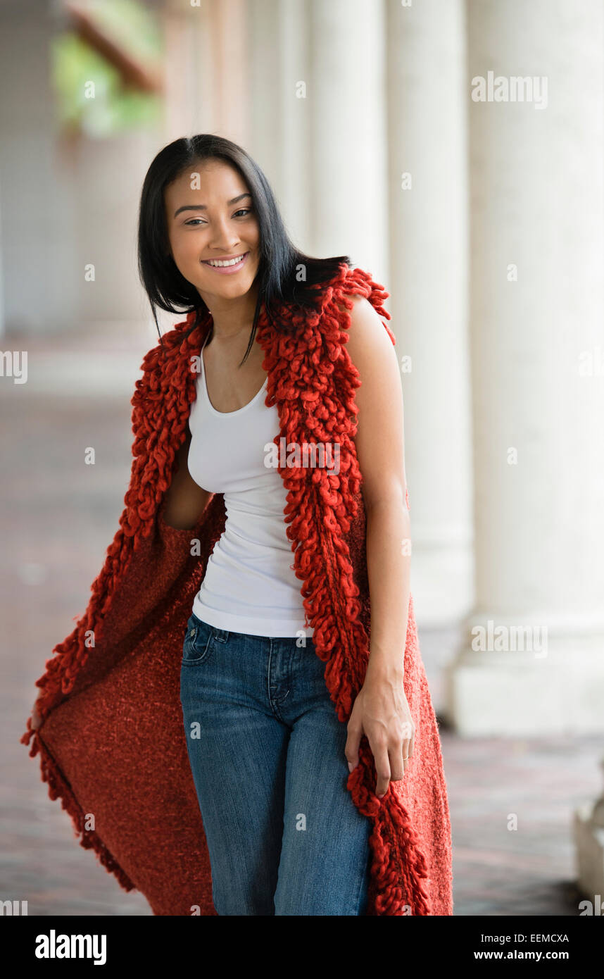 Black woman wearing draping vest Stock Photo - Alamy