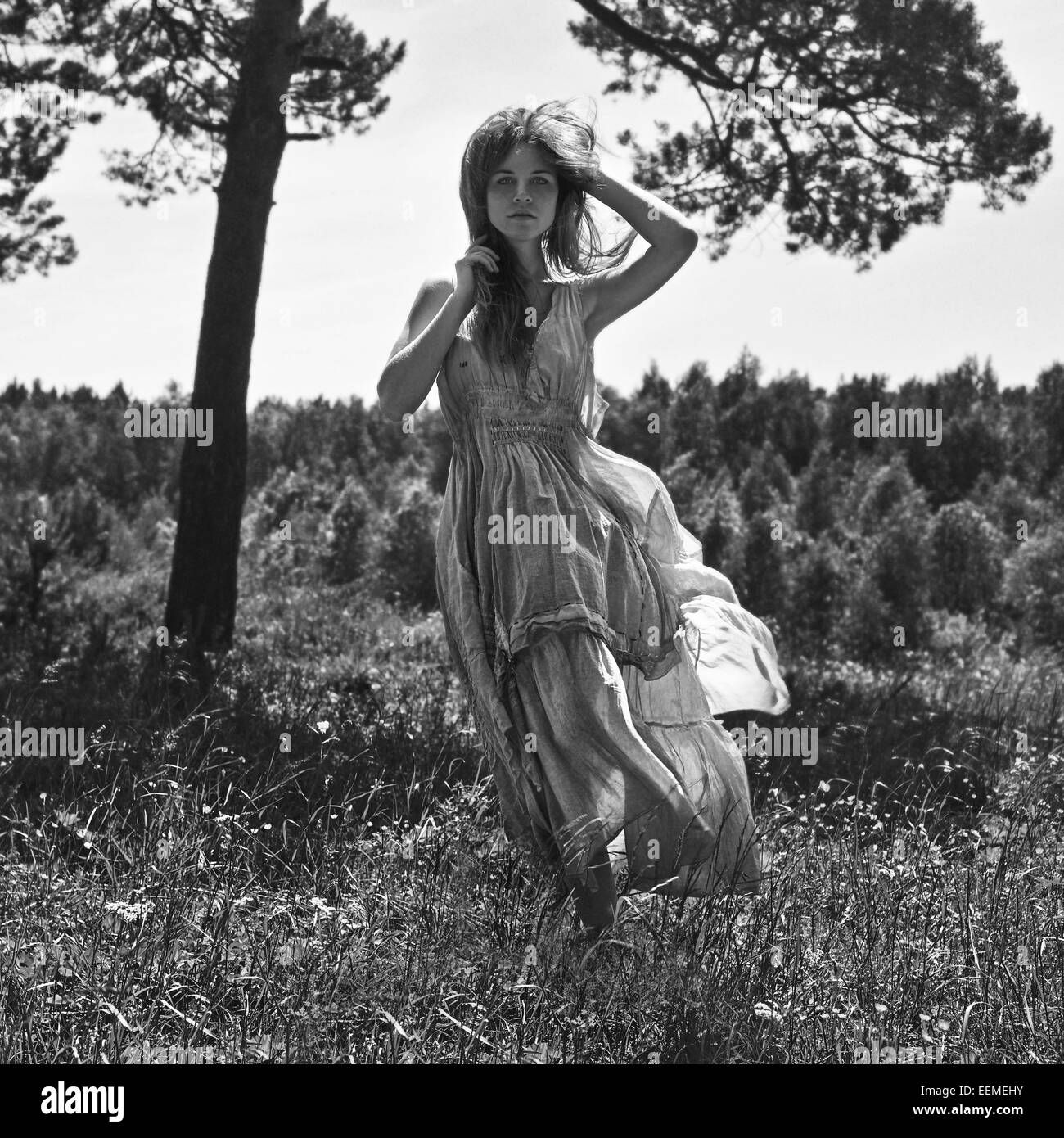 Woman walking in park Black and White Stock Photos & Images - Alamy