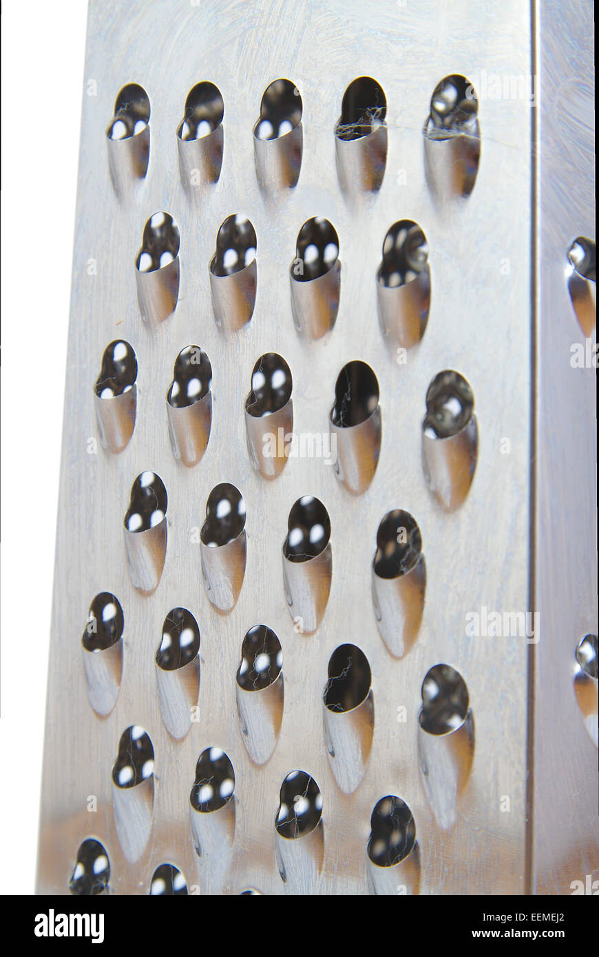 Detailed view of metal grater on white background Stock Photo - Alamy