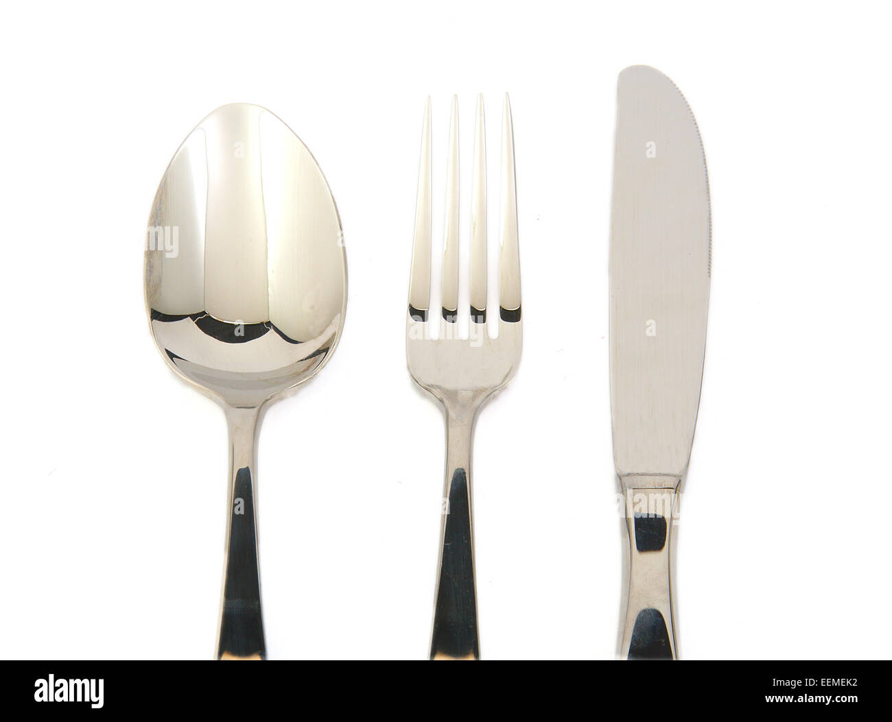 Metal fork, knife and spoon on white background Stock Photo - Alamy