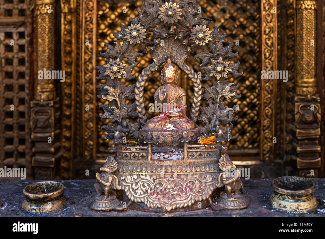 Buddhist bronze figure in Buddhist monastery Kwa Bahal, Golden Temple ...
