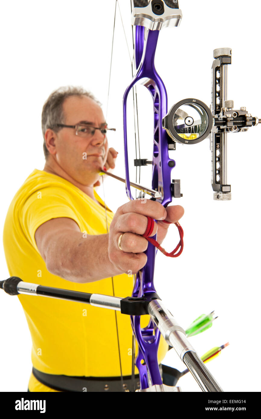 Man with yellow shirt and jeans holding a longbow in closeup Stock ...
