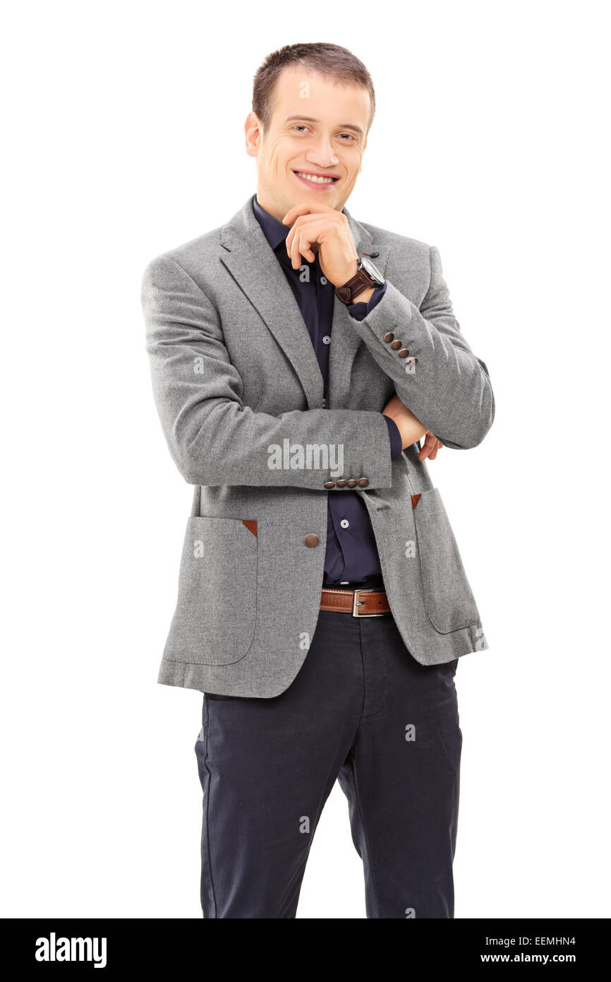 Vertical shot of a young peaceful man posing isolated on white ...