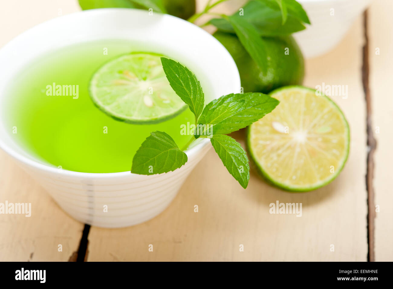fresh and healthy mint infusion tea tisane with lime Stock Photo - Alamy