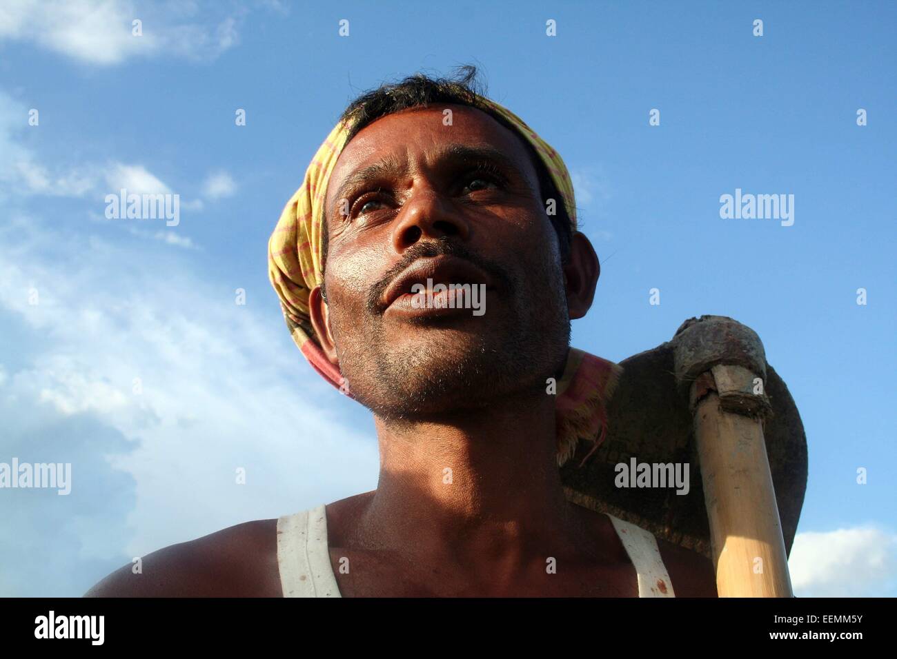 Bangladesh 10 January 2015. Farmer using cell phone Stock Photo - Alamy