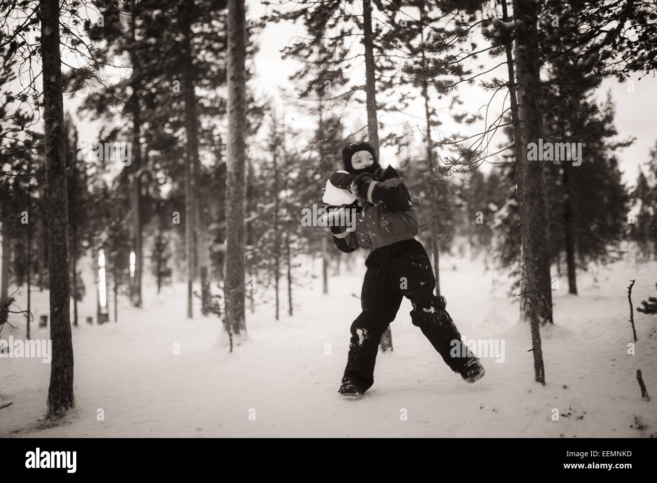 Boy with snowball hi-res stock photography and images - Alamy