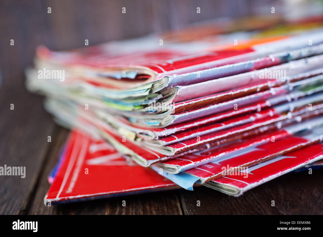 stack of magazines on the wooden table Stock Photo - Alamy