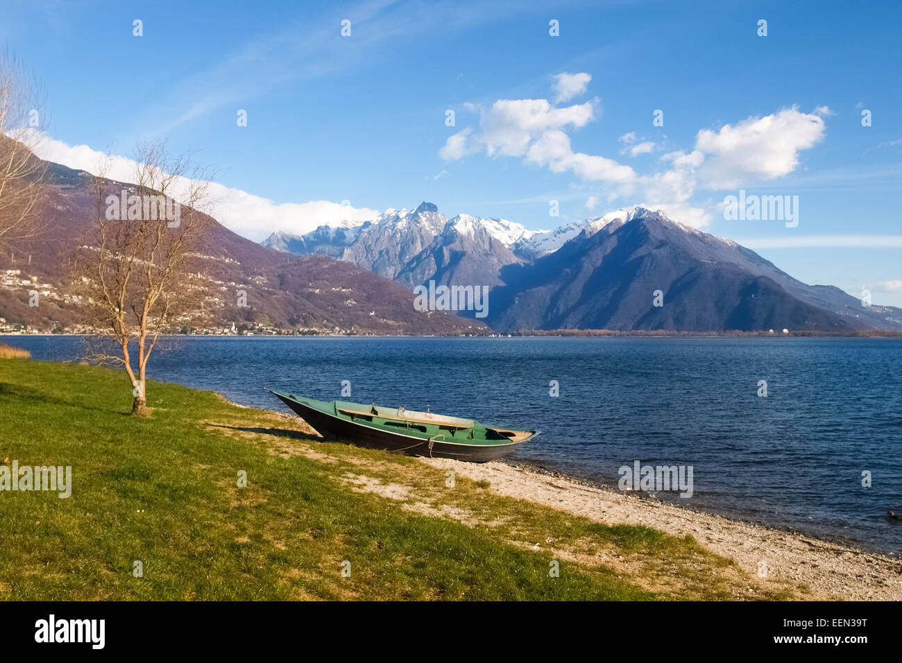 Lake of Como, Italy. Panorama of the lake and mountains from the beach ...