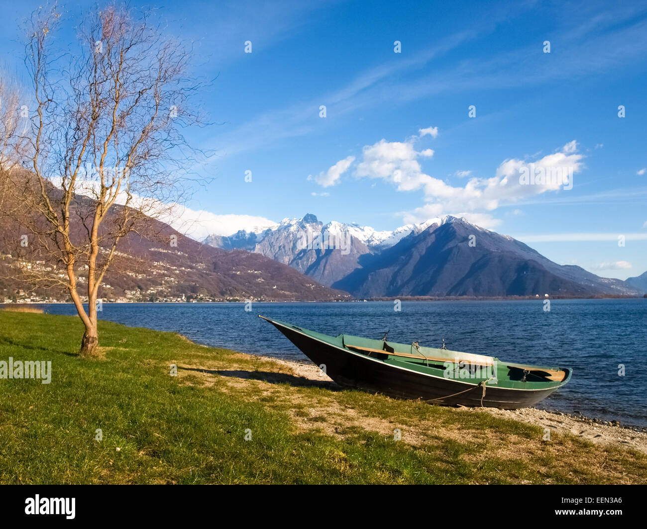 Lake of Como, Italy. Panorama of the lake and mountains from the beach ...