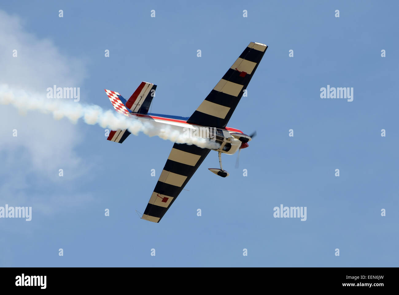 Light aerobatic airplane practicing maneuvers Stock Photo - Alamy
