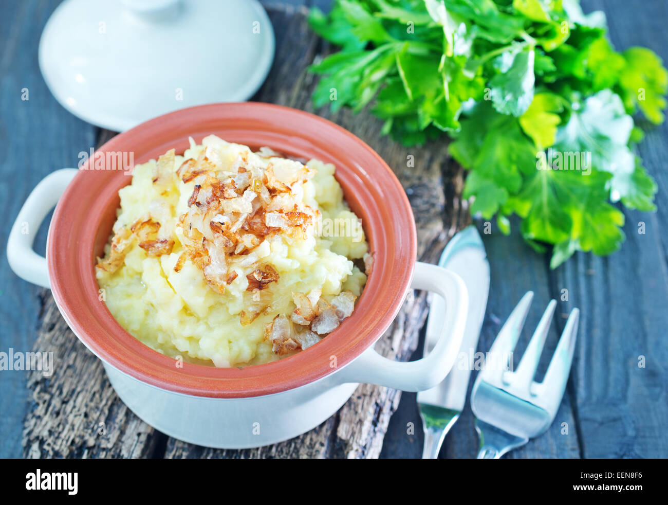 mashed potato in bowl and on a table Stock Photo - Alamy