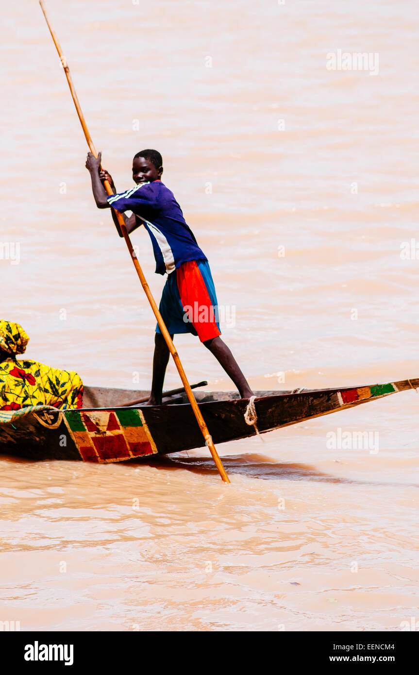 Boy in a canoe on the Niger river, Mopti, Mali Stock Photo - Alamy