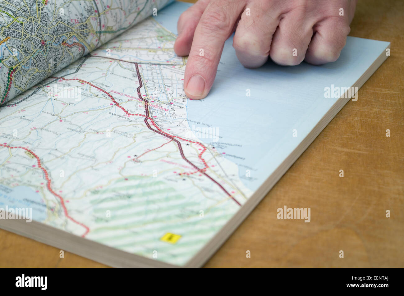 Pointing finger map hi-res stock photography and images - Alamy
