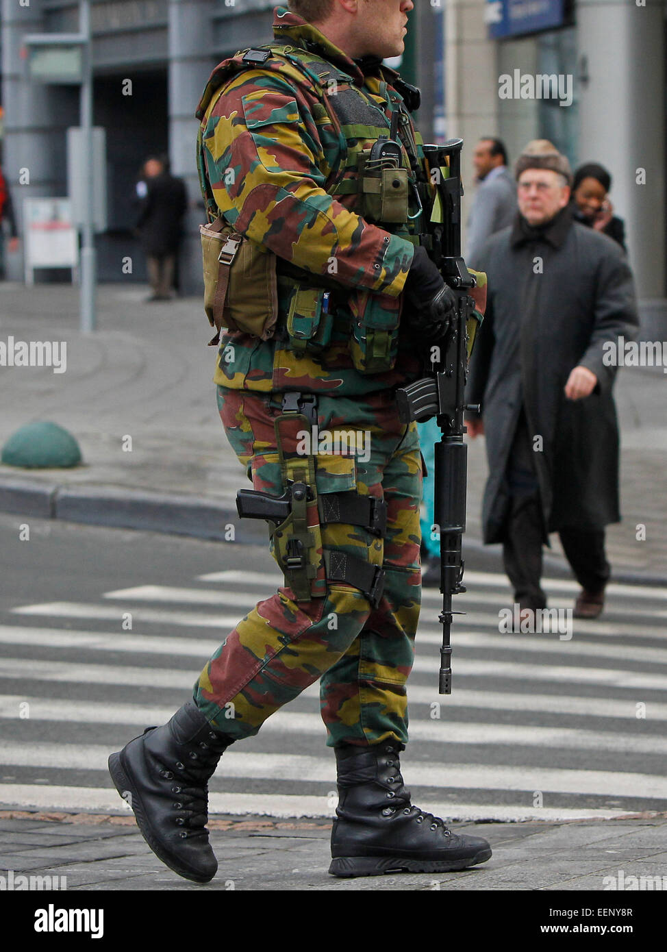 Brussels, Belgium. 20th January, 2015. A Belgian soldier patrols ...