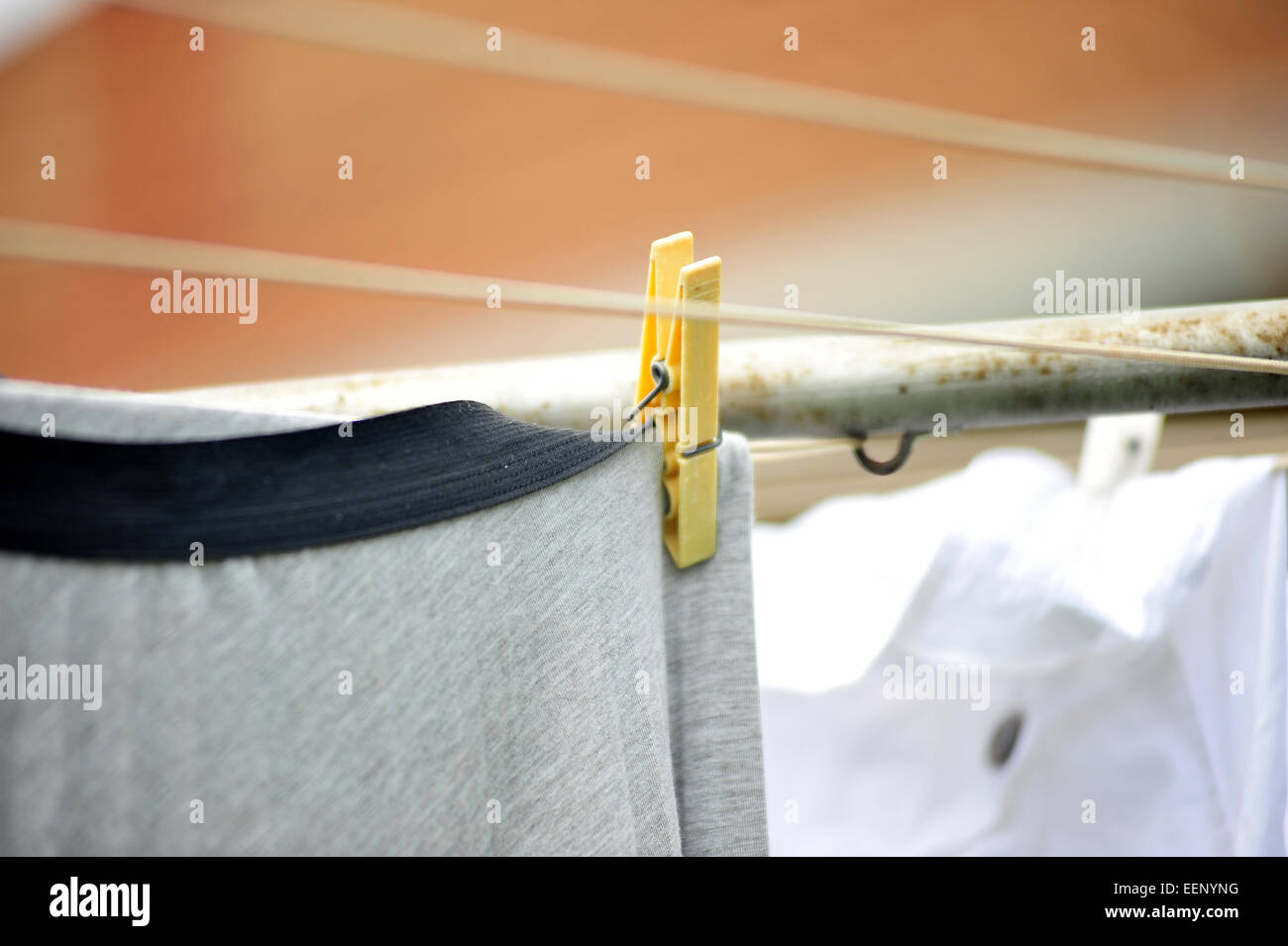Clothes line with pegs hi-res stock photography and images - Alamy
