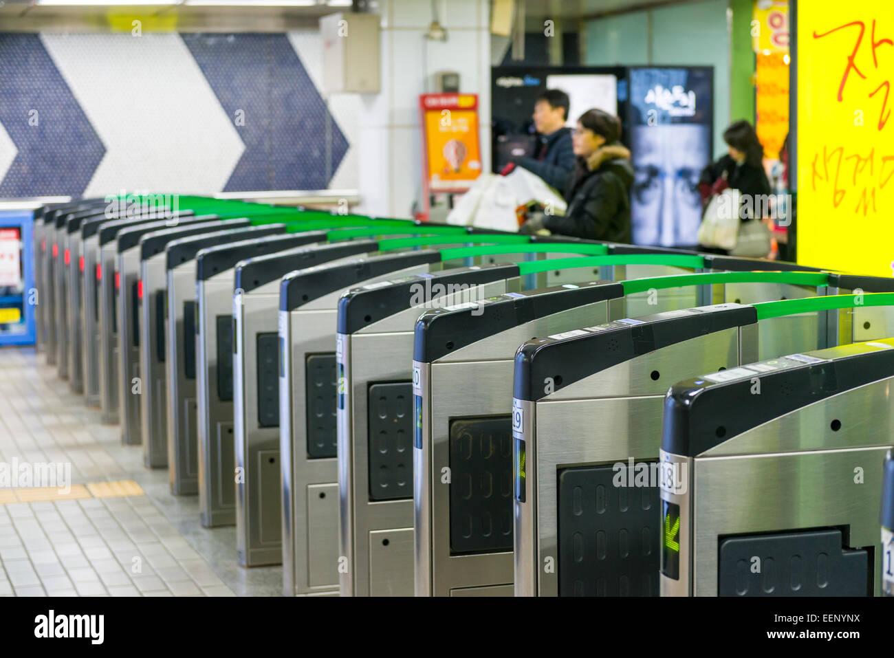 Local Seoulites swipe their metro cards at Gangnam Station on December ...