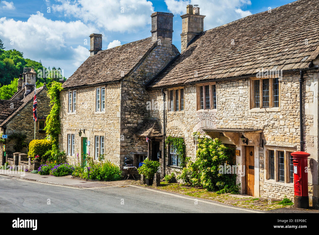 Stone cottages in the Cotswold village of Castle Combe in Wiltshire ...