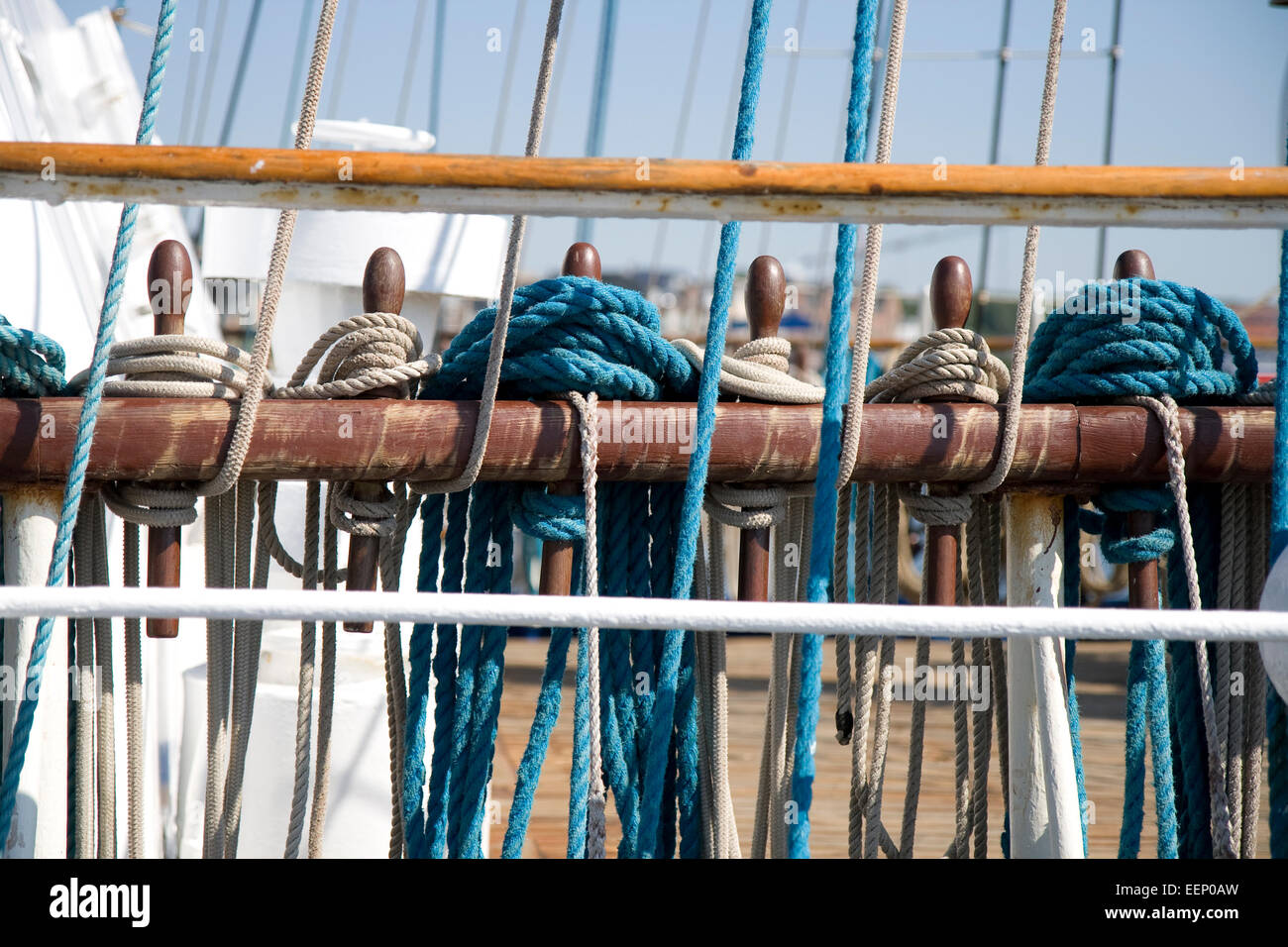 Ropes on belaying pins on board a sailing ship Stock Photo - Alamy