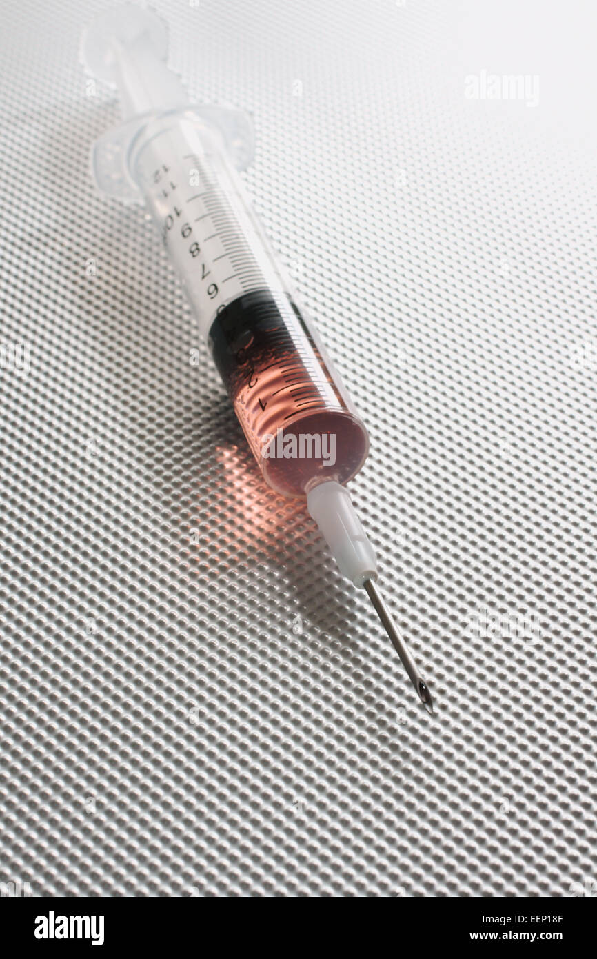 Syringe ready for injection Stock Photo - Alamy