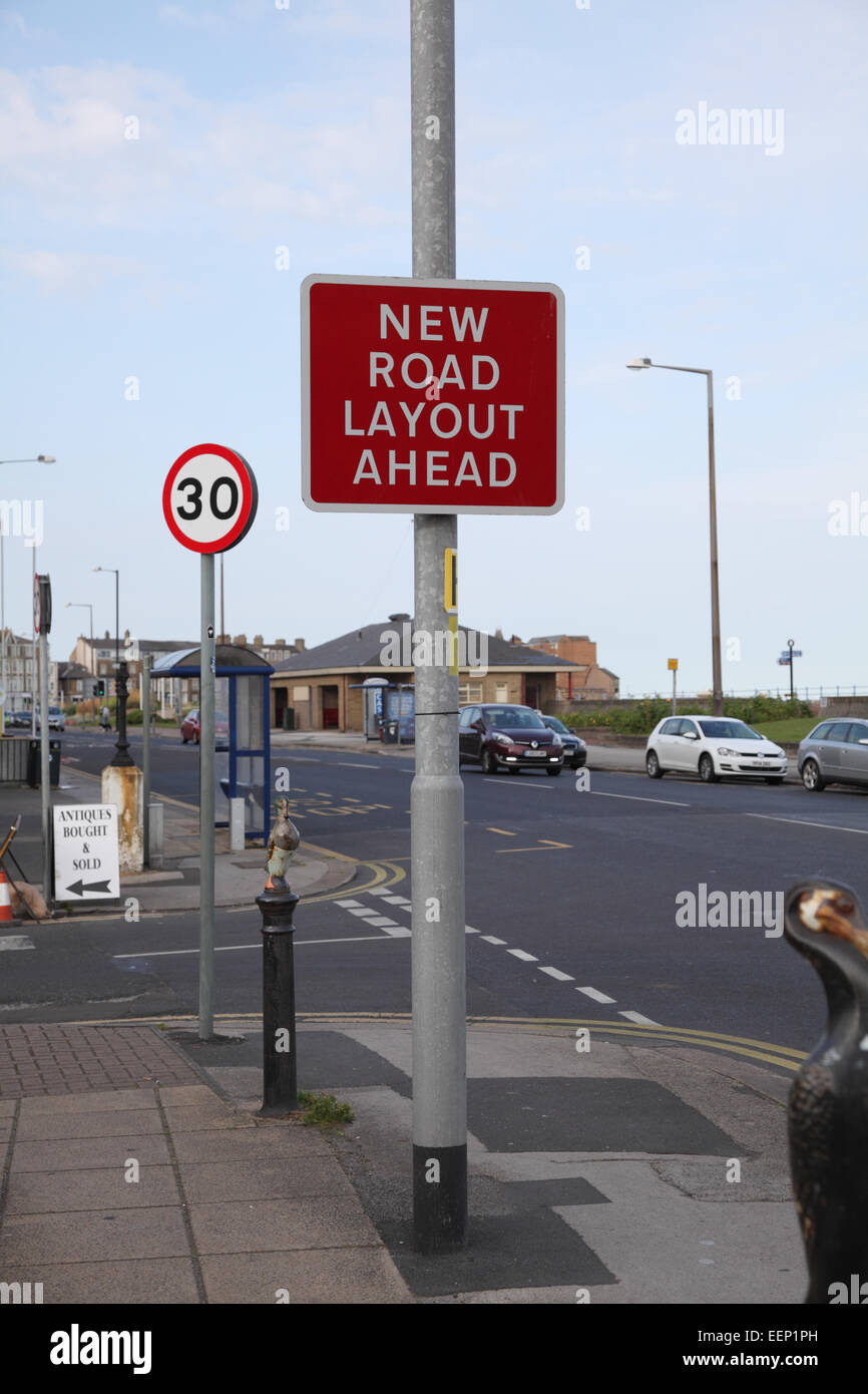 Sign New road layout ahead Stock Photo - Alamy