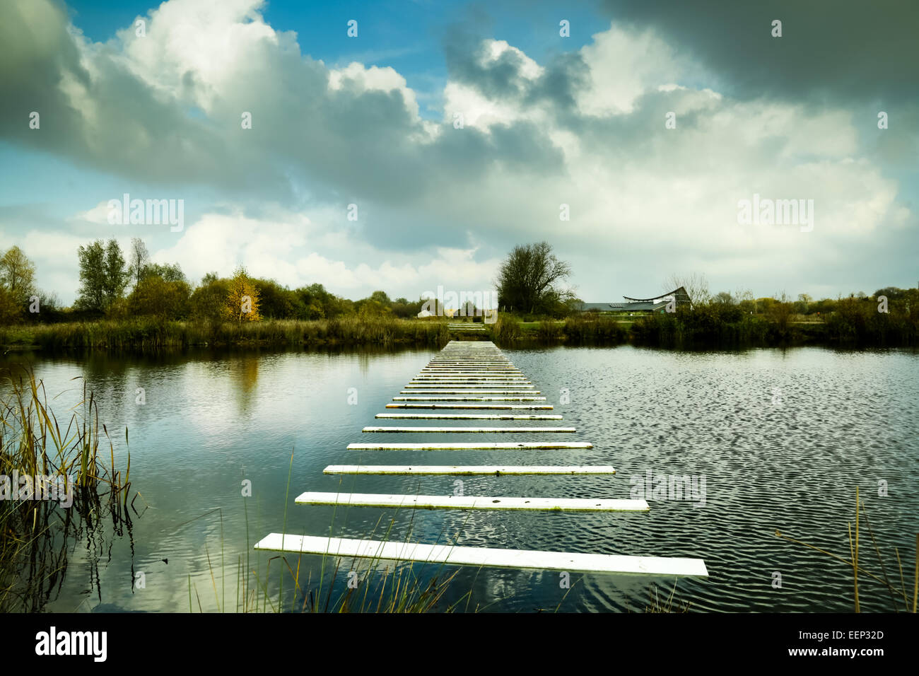 An art installation of floating steps apparently crossing over water ...