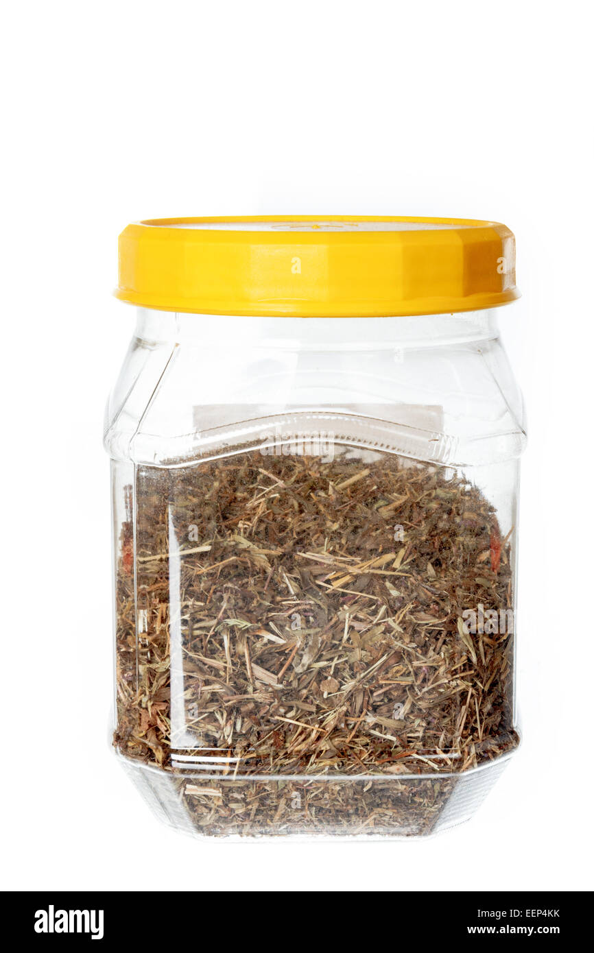Dried natural rooibos herbal tea in plastic jar. Object isolated on ...