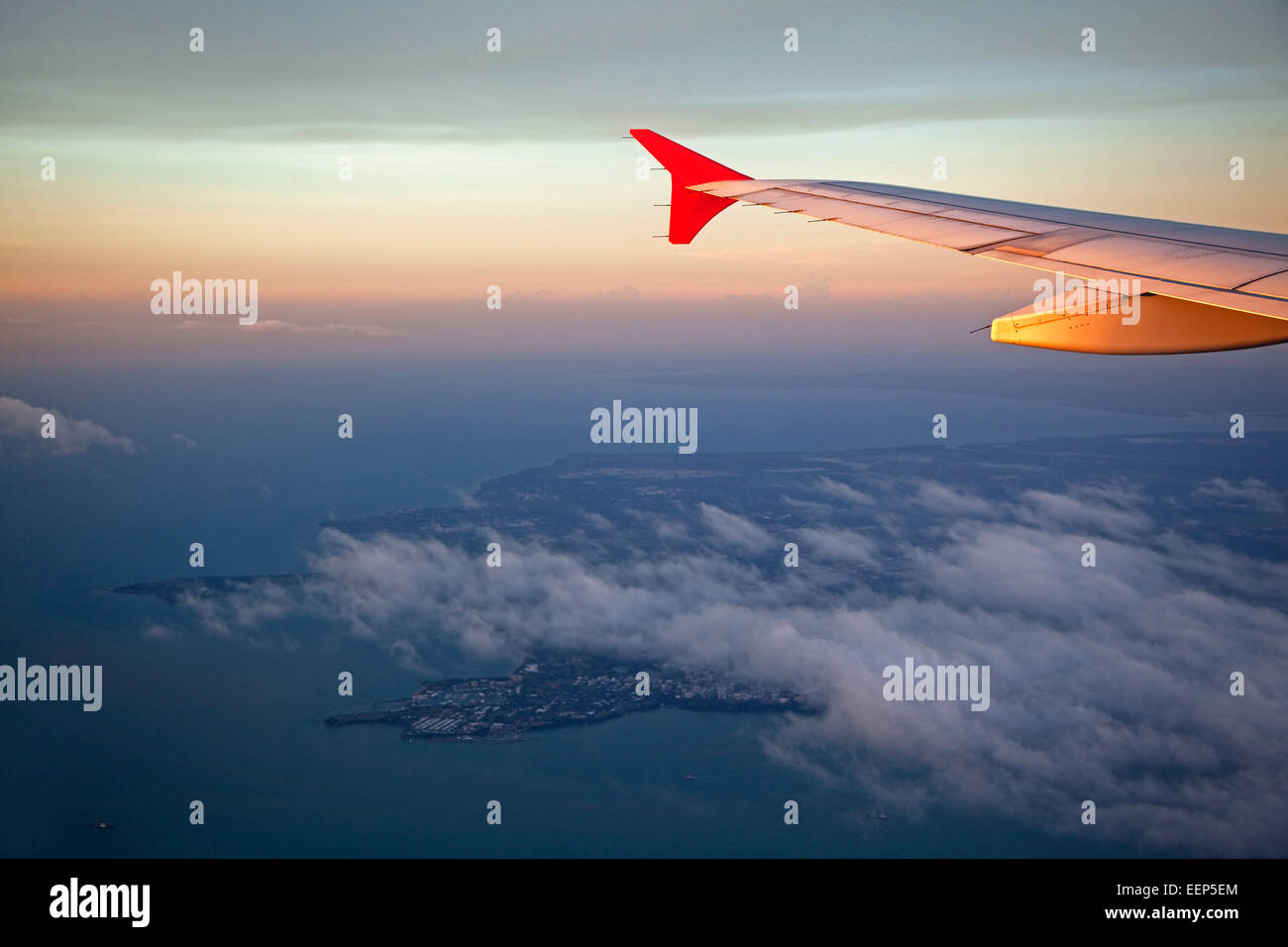 Aerial view from airplane over the city Darwin at sunset, Northern ...