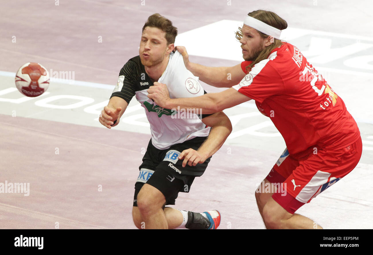 Germany's Martin Strobel (l) and Denmark's Mikkel Hansen challenge for ...