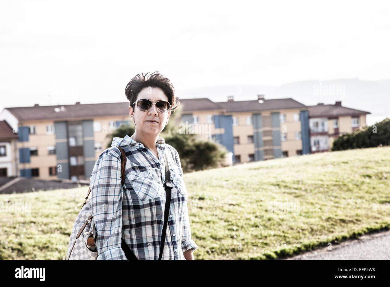 Woman looking direct to camera Stock Photo - Alamy