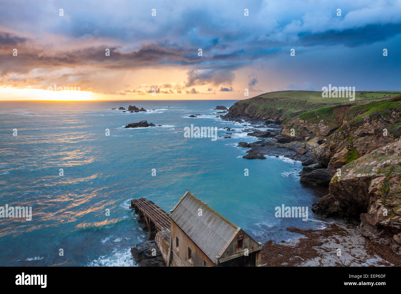 Dramtic sunset over Polpeor Cove at Lizard Point Cornwall England UK ...