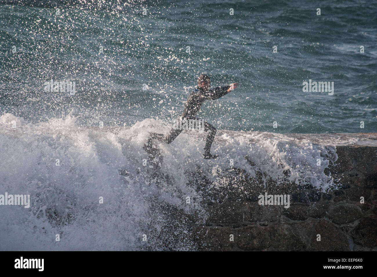 Jumping off harbour wall hi-res stock photography and images - Alamy