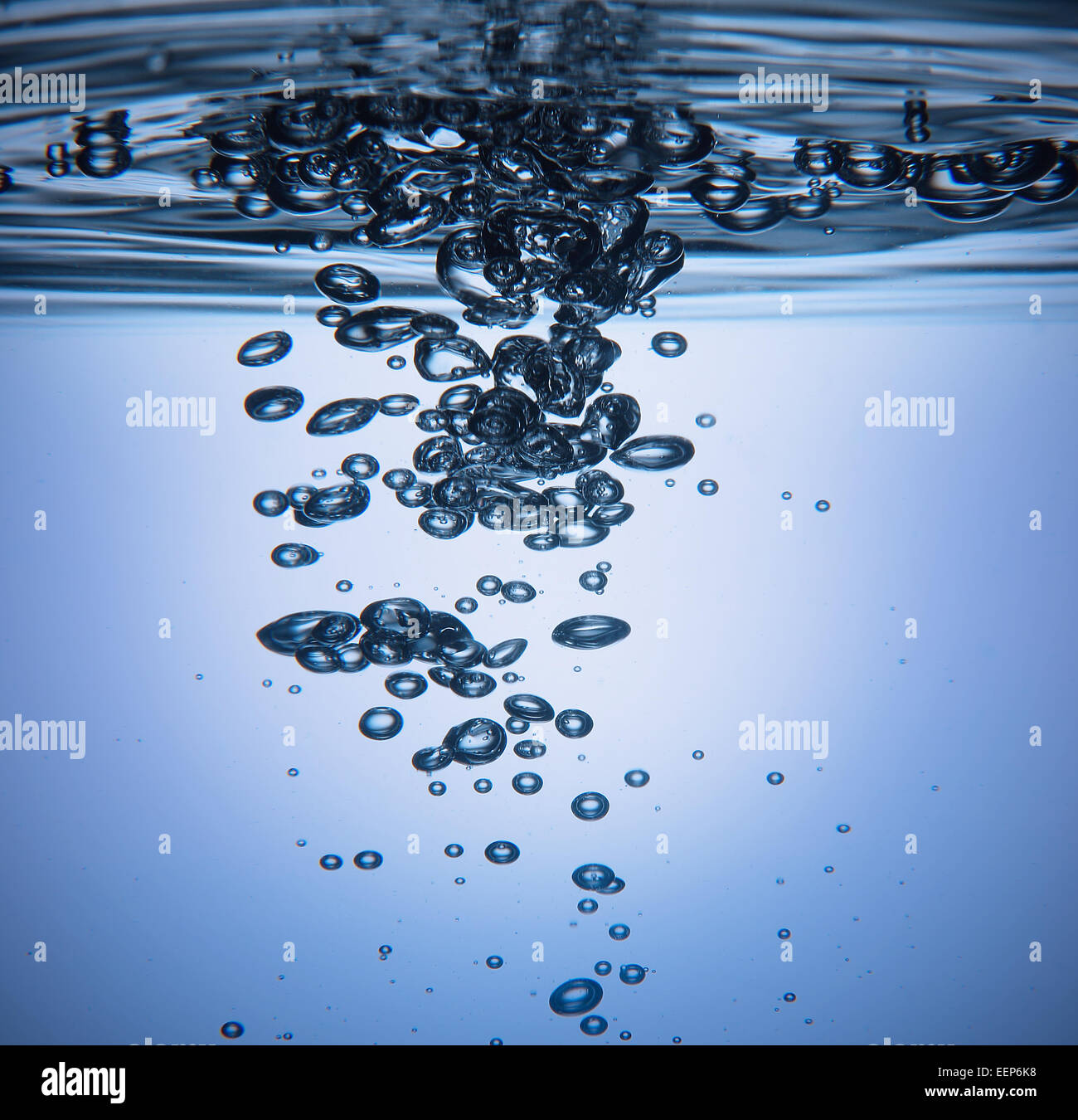 Bubbles from pouring water Stock Photo - Alamy