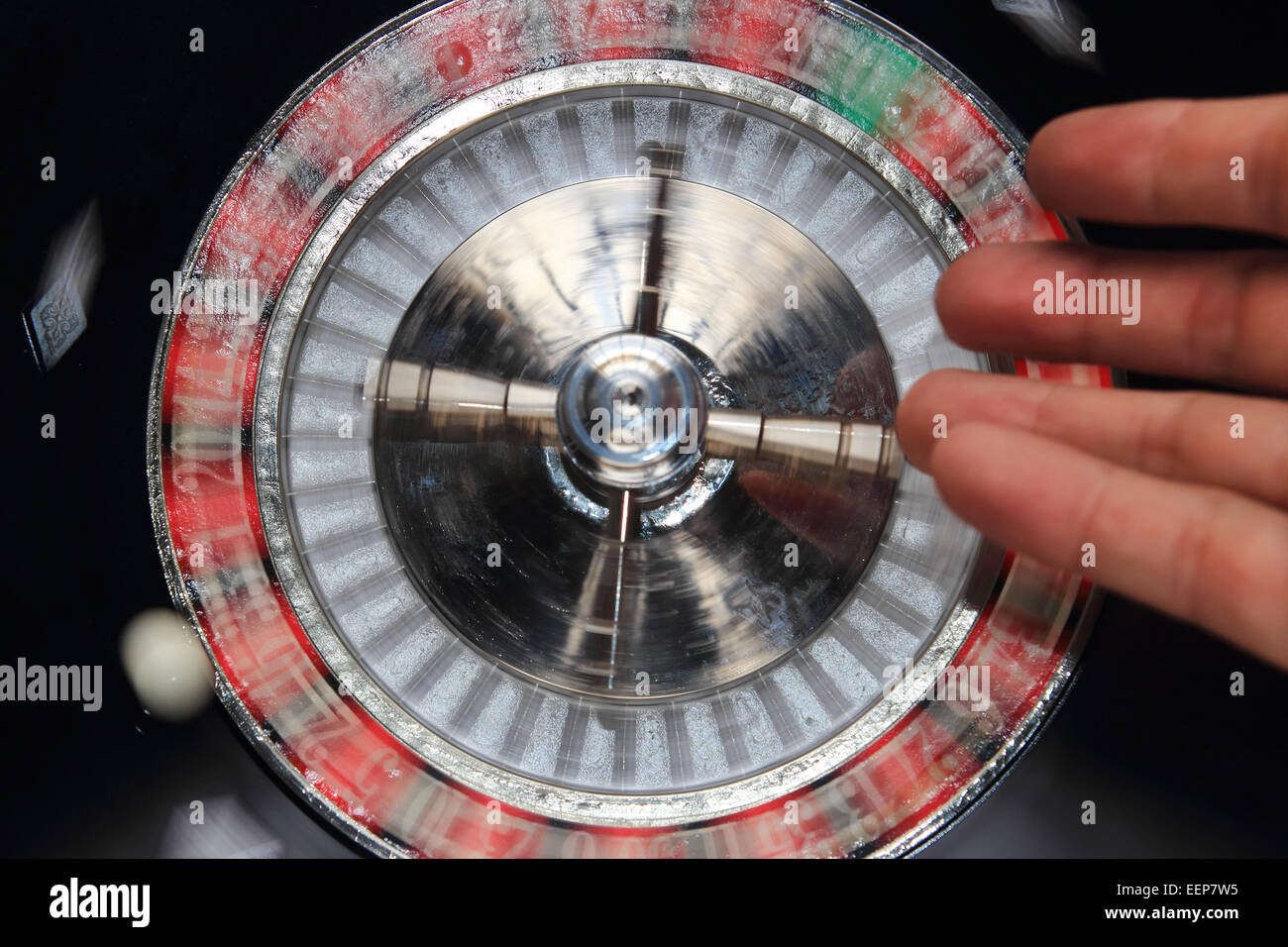 gambling concept detail of a spinning roulette wheel Stock Photo - Alamy