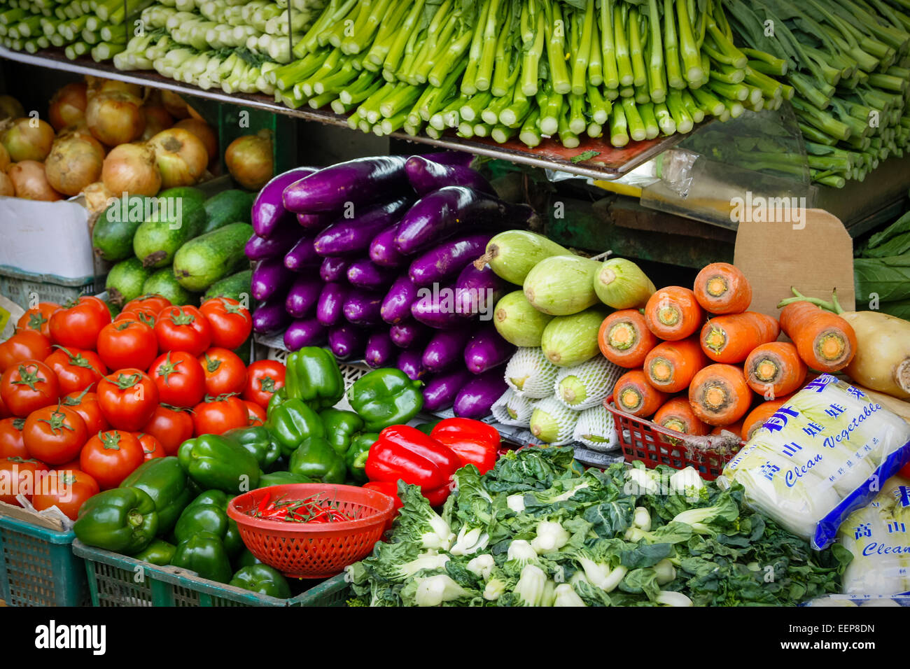 Fresh fruit and veg displayed on a market stall in Hong Kong, China ...