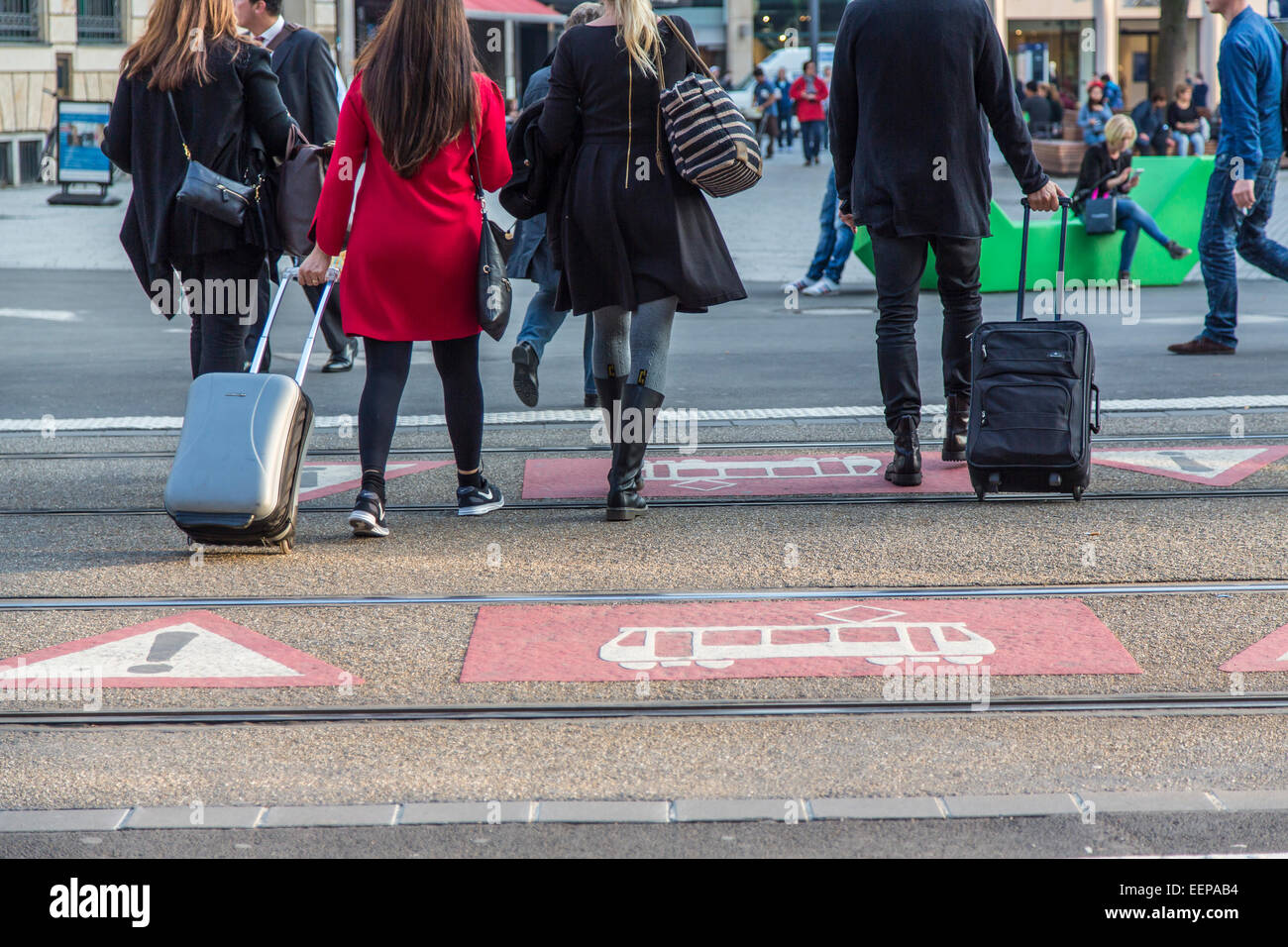 Pedestrian crossing on a transit route indicator flags for pedestrians ...