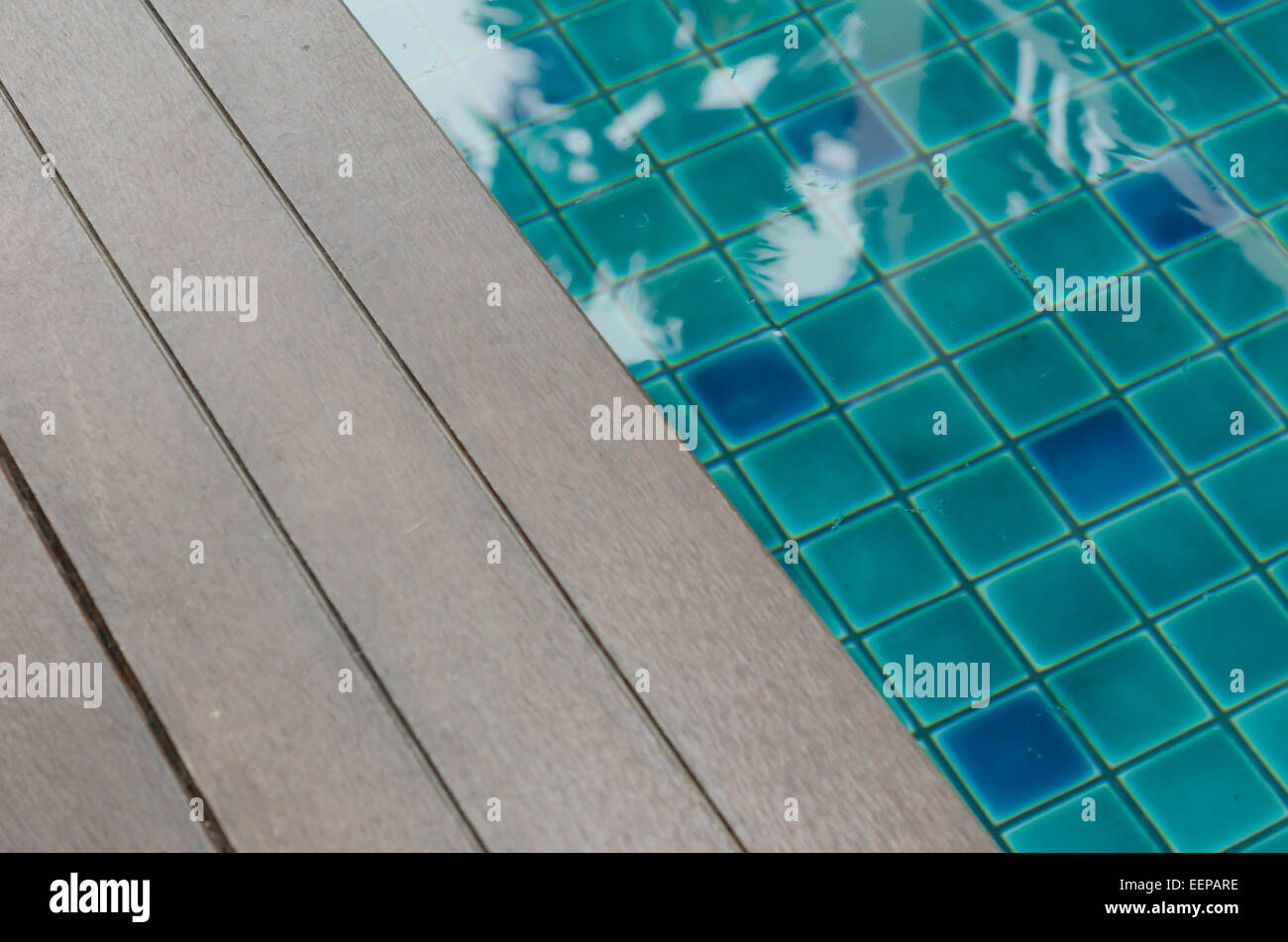 close up swimming pool with wood flooring stripes Stock Photo - Alamy
