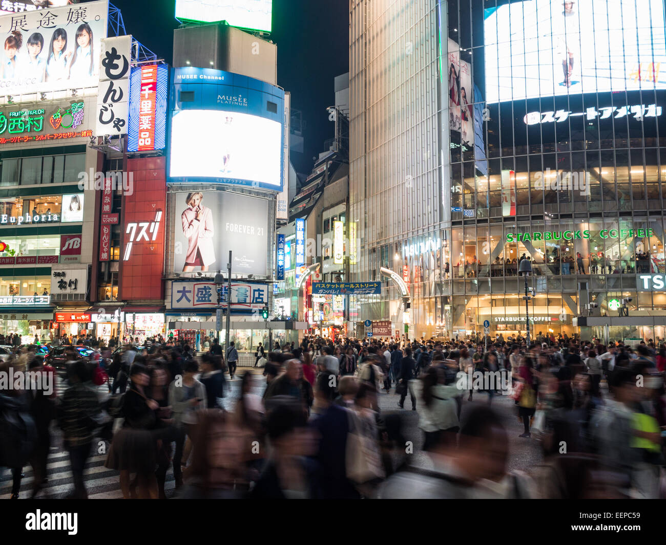 Blurred crowd movement at street level in Shibuya crossing Stock Photo ...