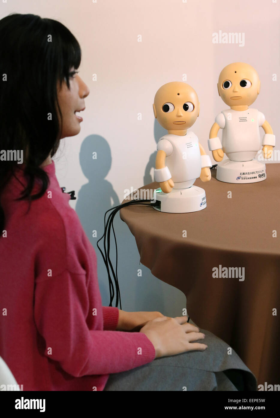 Tokyo, Japan. 20th Jan, 2015. A symbiotic human-robot Otonaroid, left ...