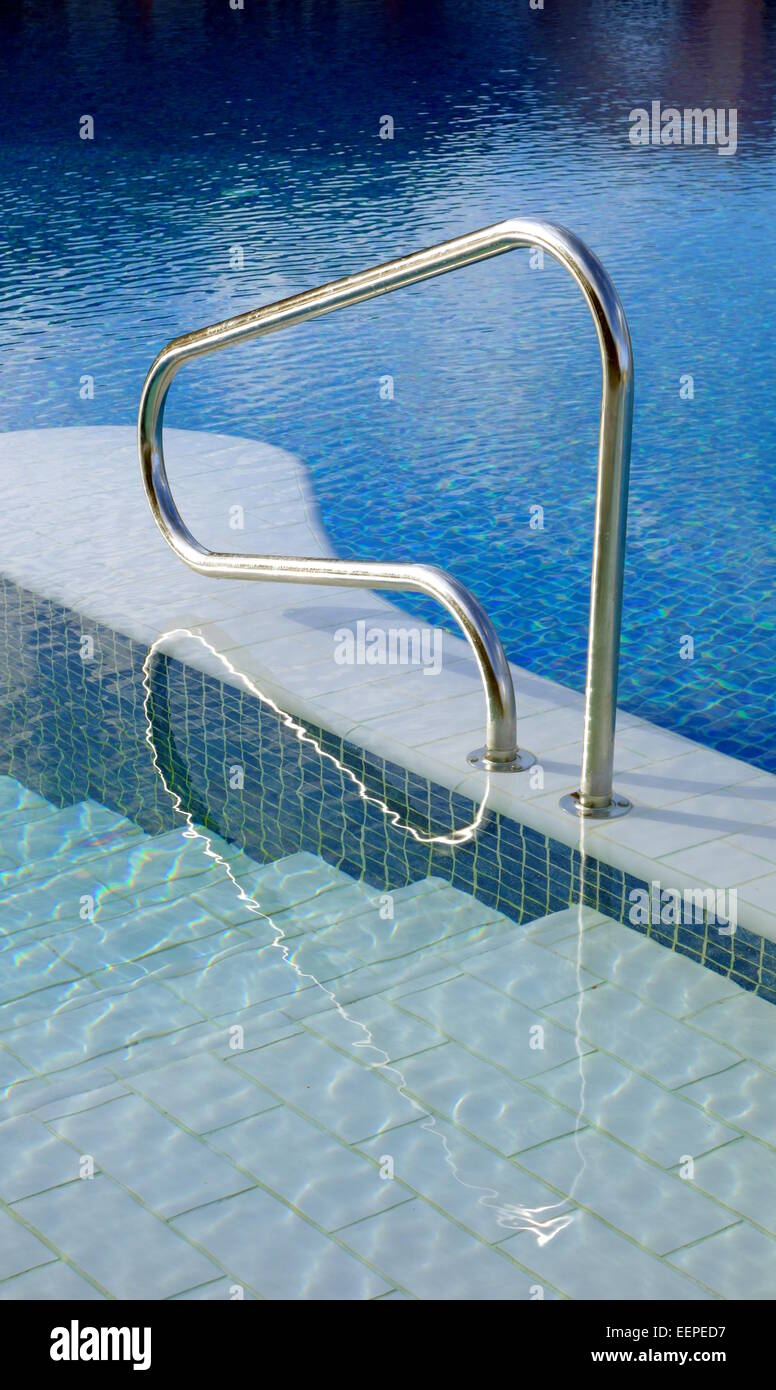 Swimming pool access at a resort in Cuba Stock Photo - Alamy