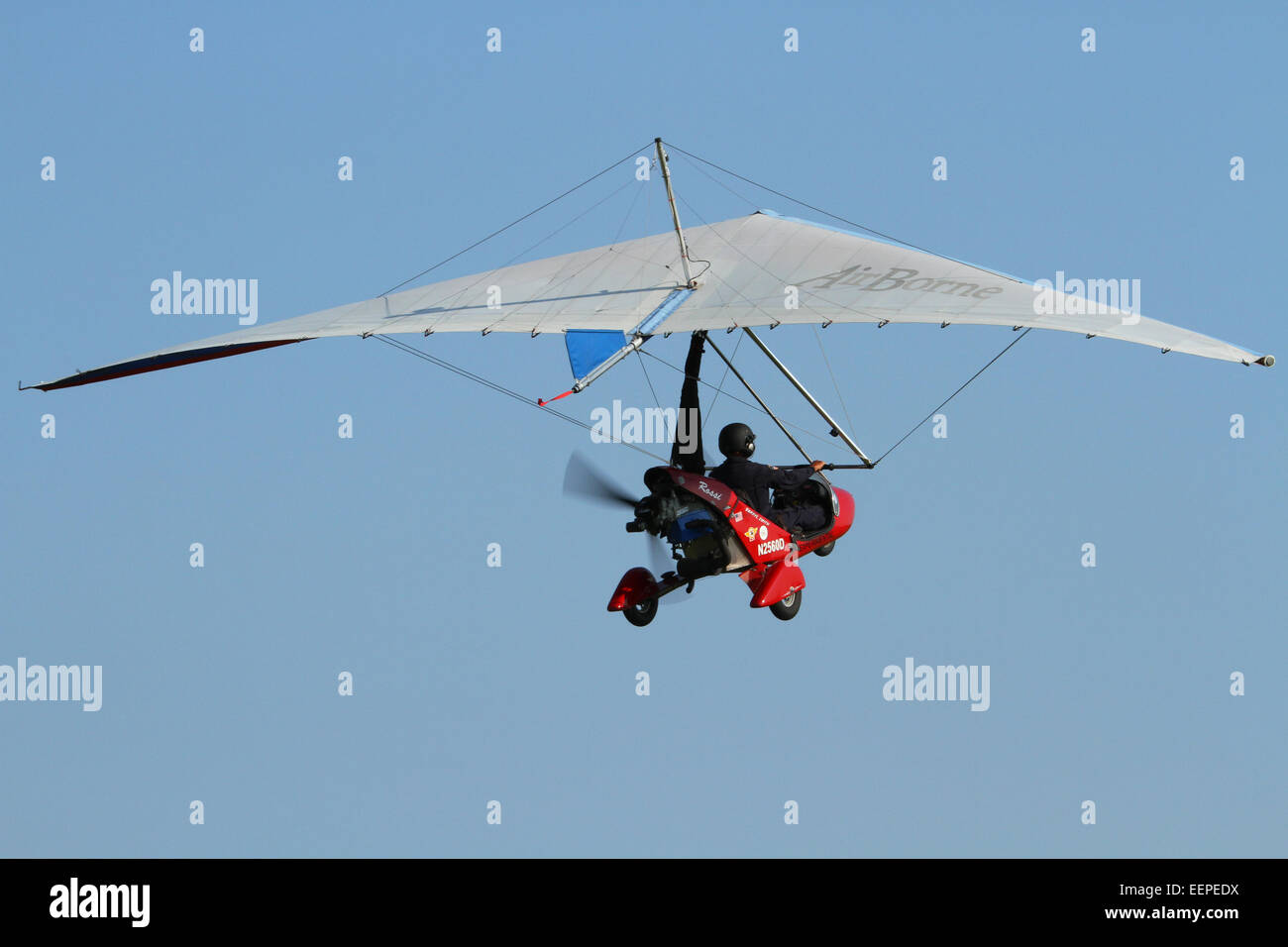 ROSSI model 1+1 Weight-shift-control experimental aircraft. Adult man ...