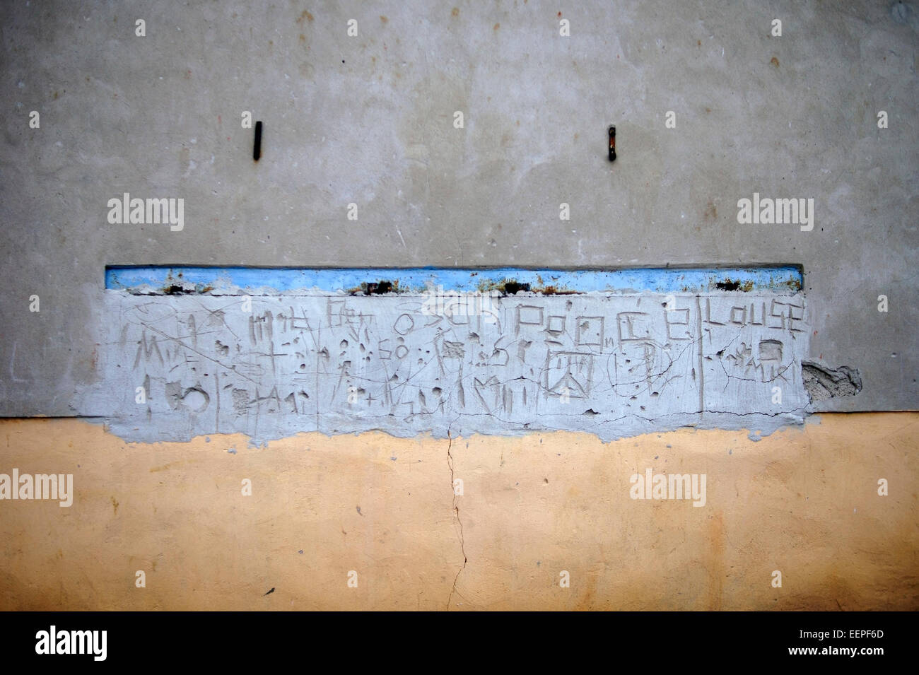 Plaster wall with signs hi-res stock photography and images - Alamy