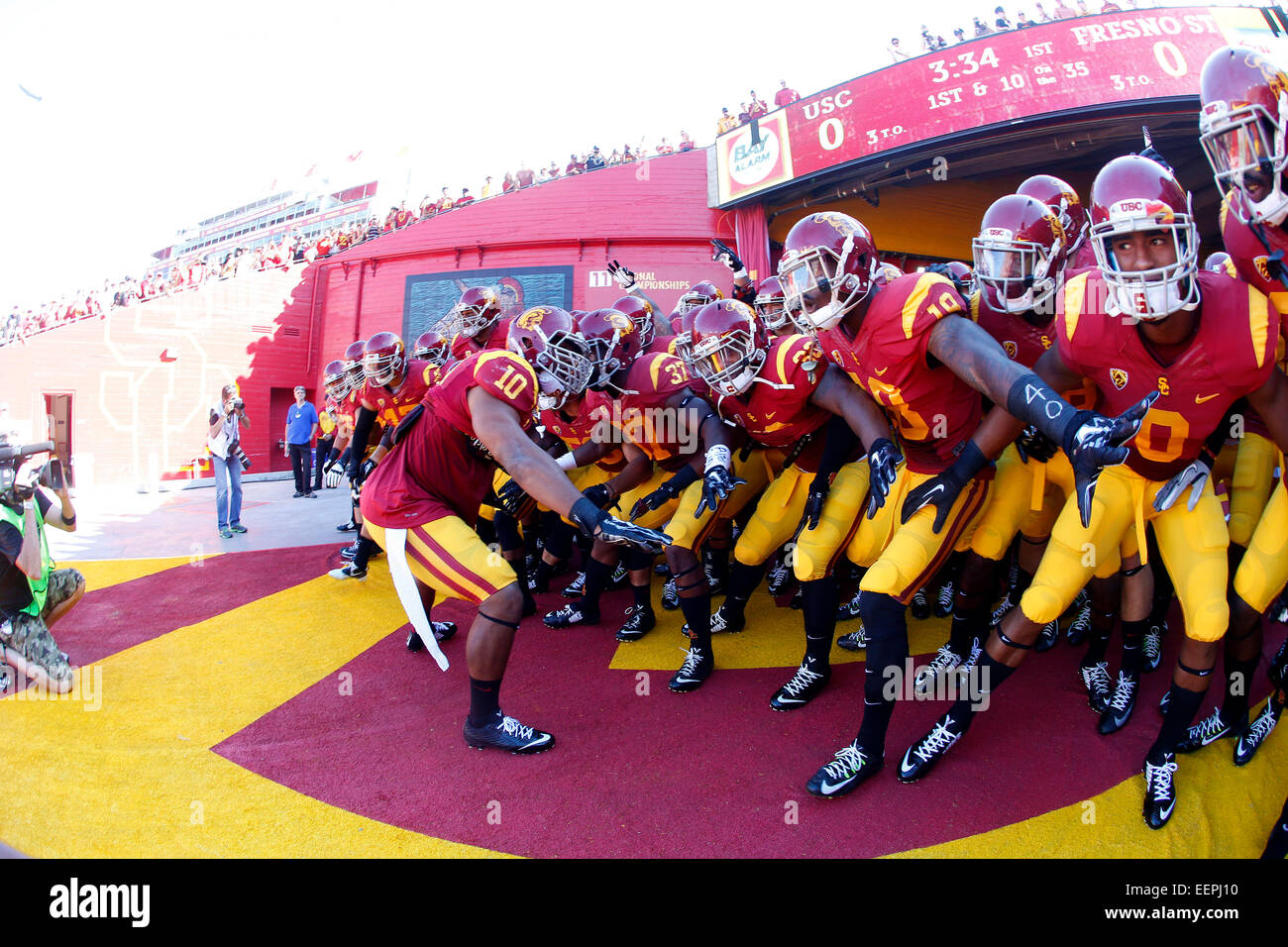 Los Angeles, CA, USA. 30th Aug, 2014. USC Trojans football run onto the ...